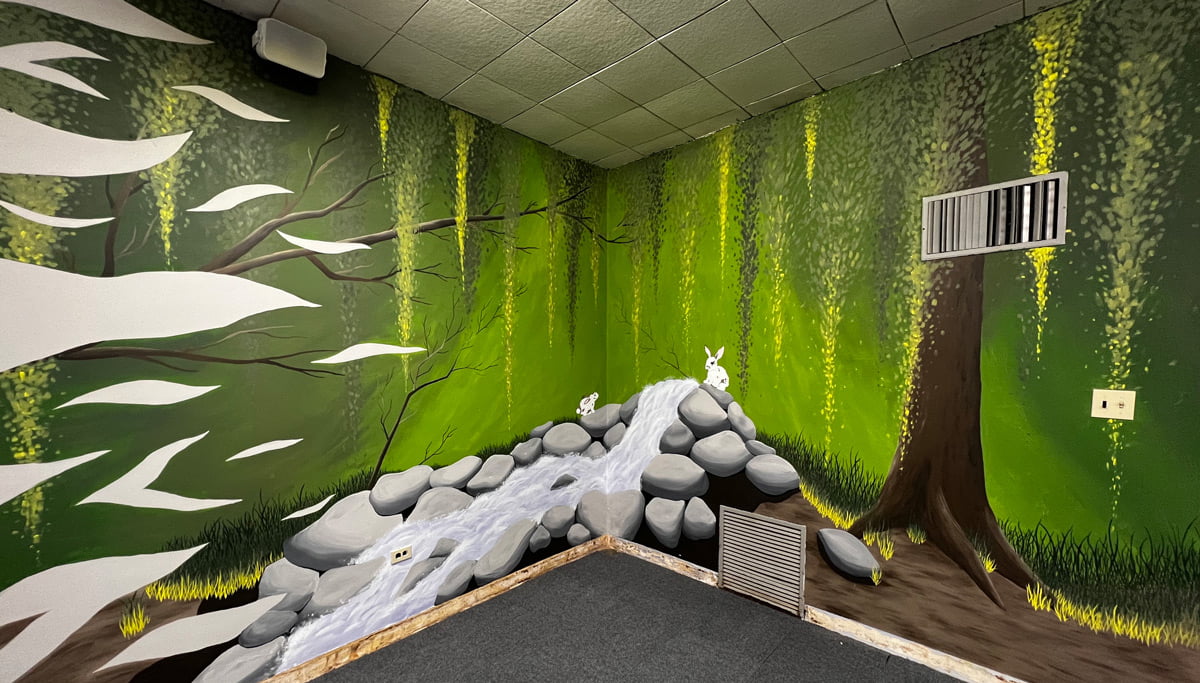 Ellis showcases artistic talents through painting murals - Hastings College